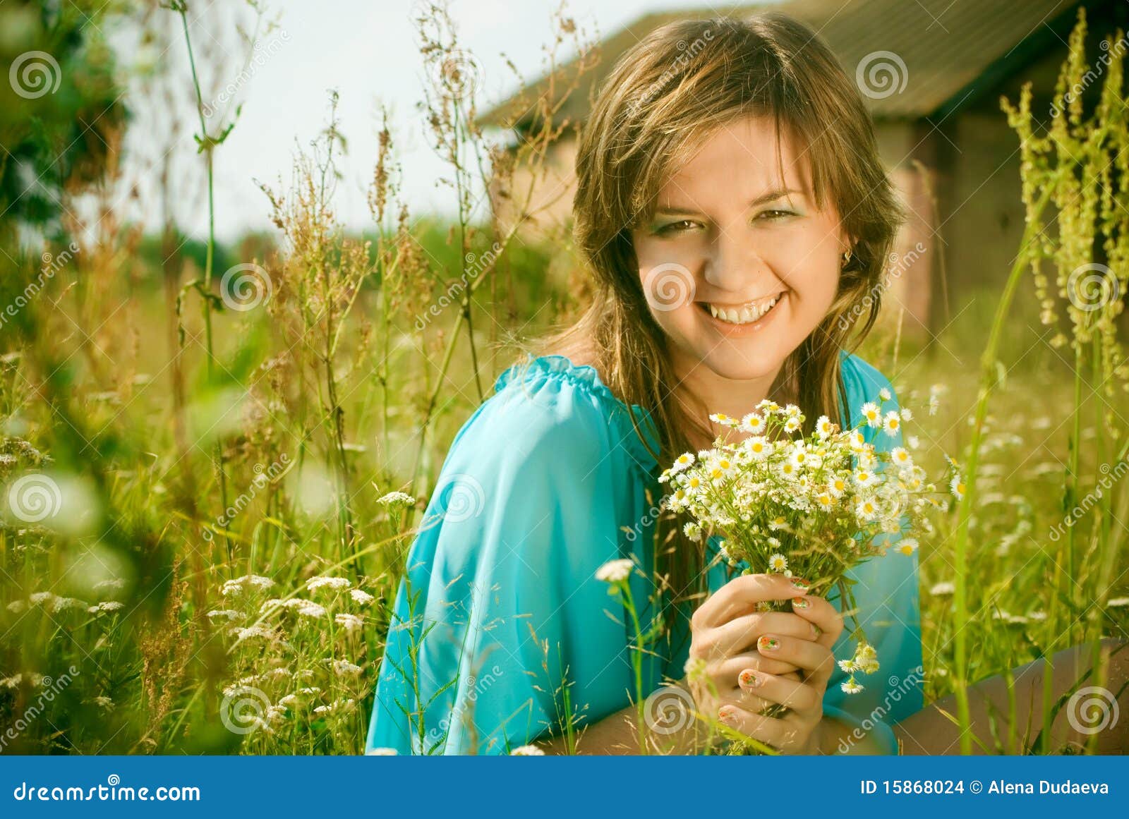 Girl sitting in a field stock photo. Image of outdoor - 15868024