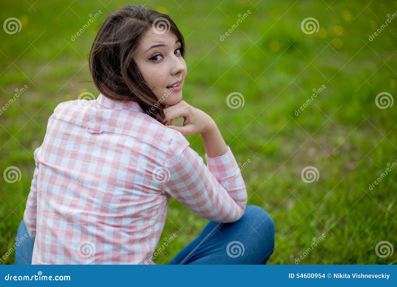 Girl sitting on the field stock photo. Image of outside - 54600954