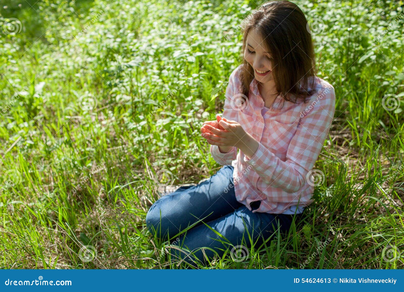 Girl sitting on the field stock image. Image of field - 54624613
