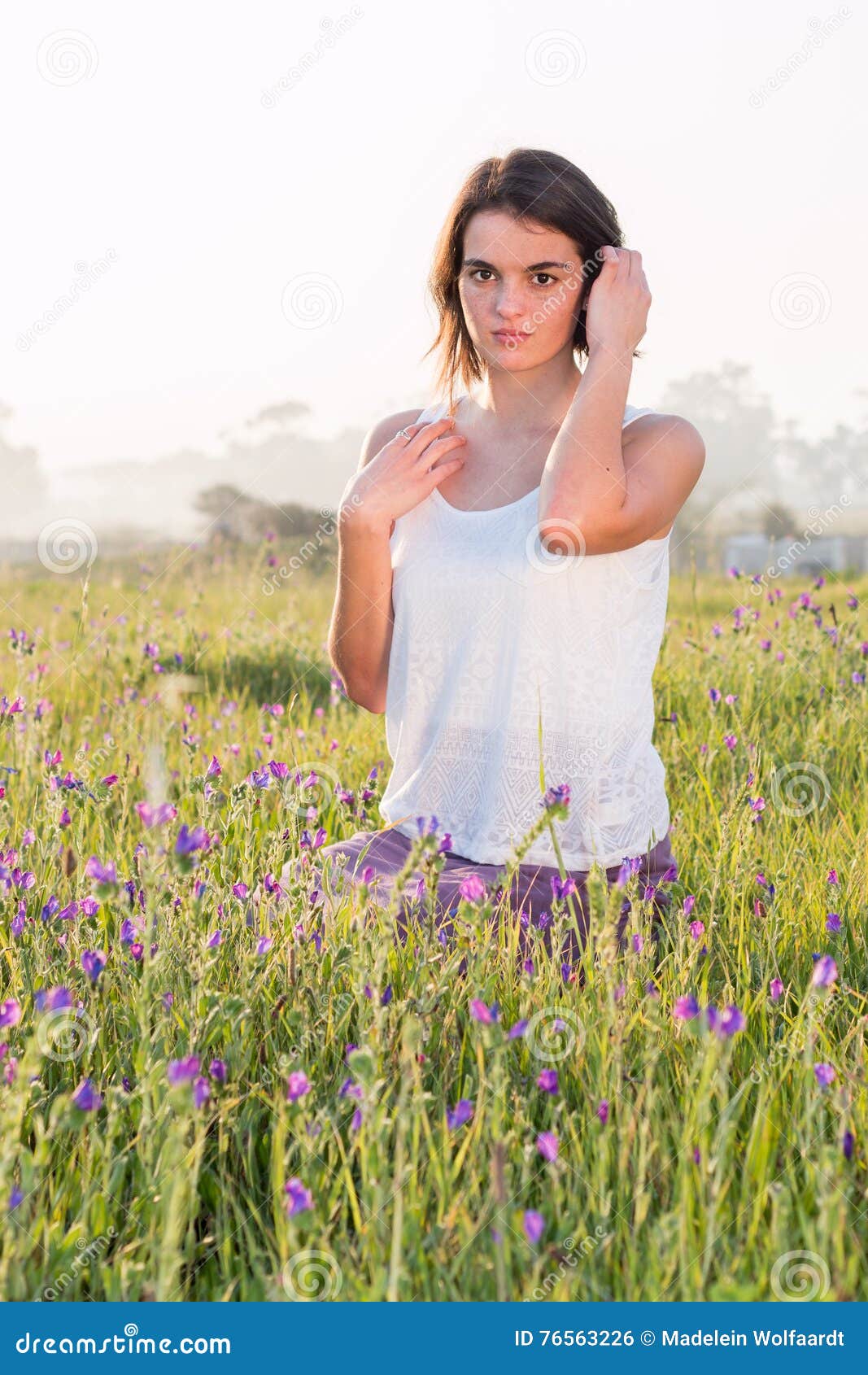 Girl Sitting in Field of Flowers Stock Photo - Image of girl, teen ...