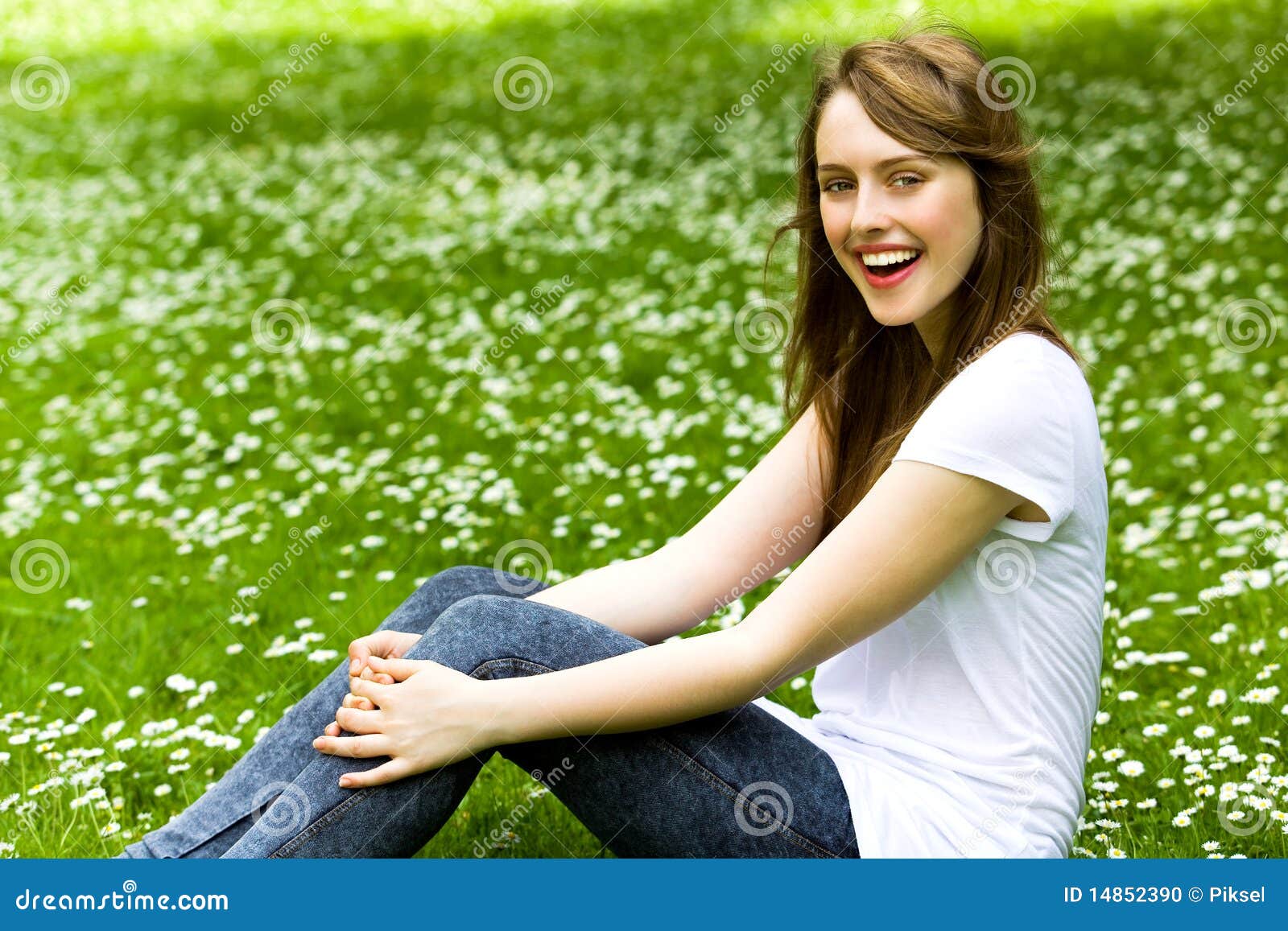 Girl sitting on the grass stock photo. Image of park - 14852390