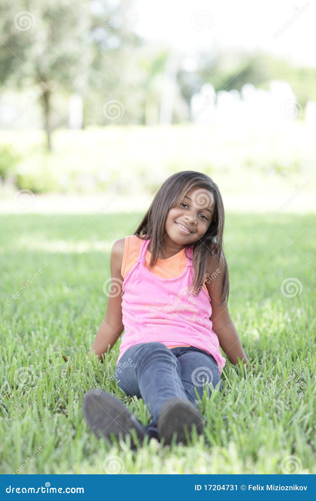 Girl sitting on the grass stock image. Image of grass - 17204731
