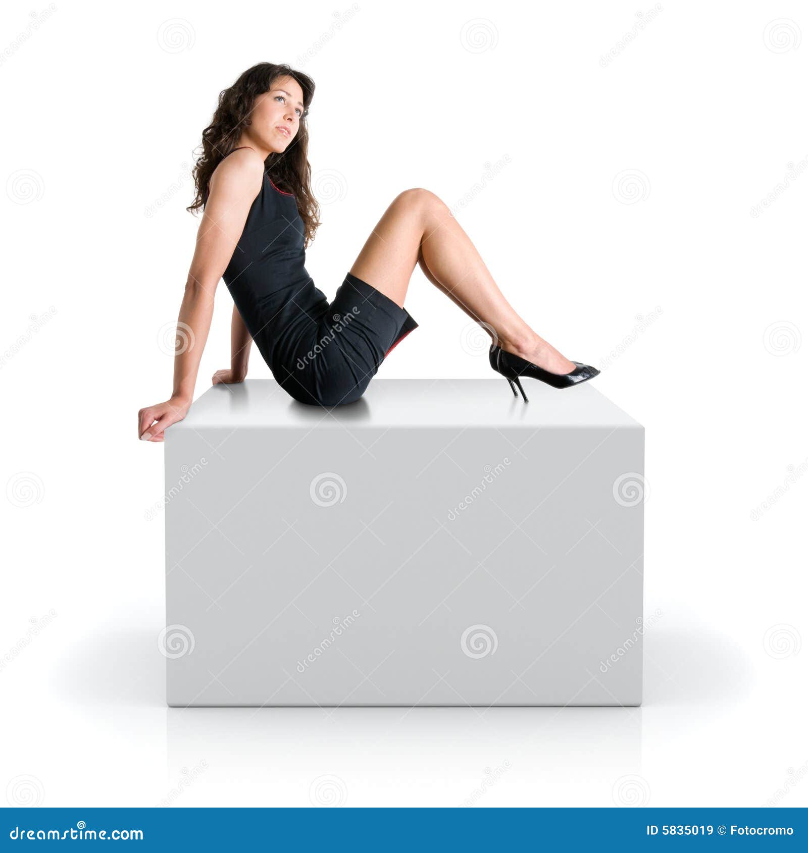 Girl Sitting On A Gray Cube Stock Image | CartoonDealer.com #5835019