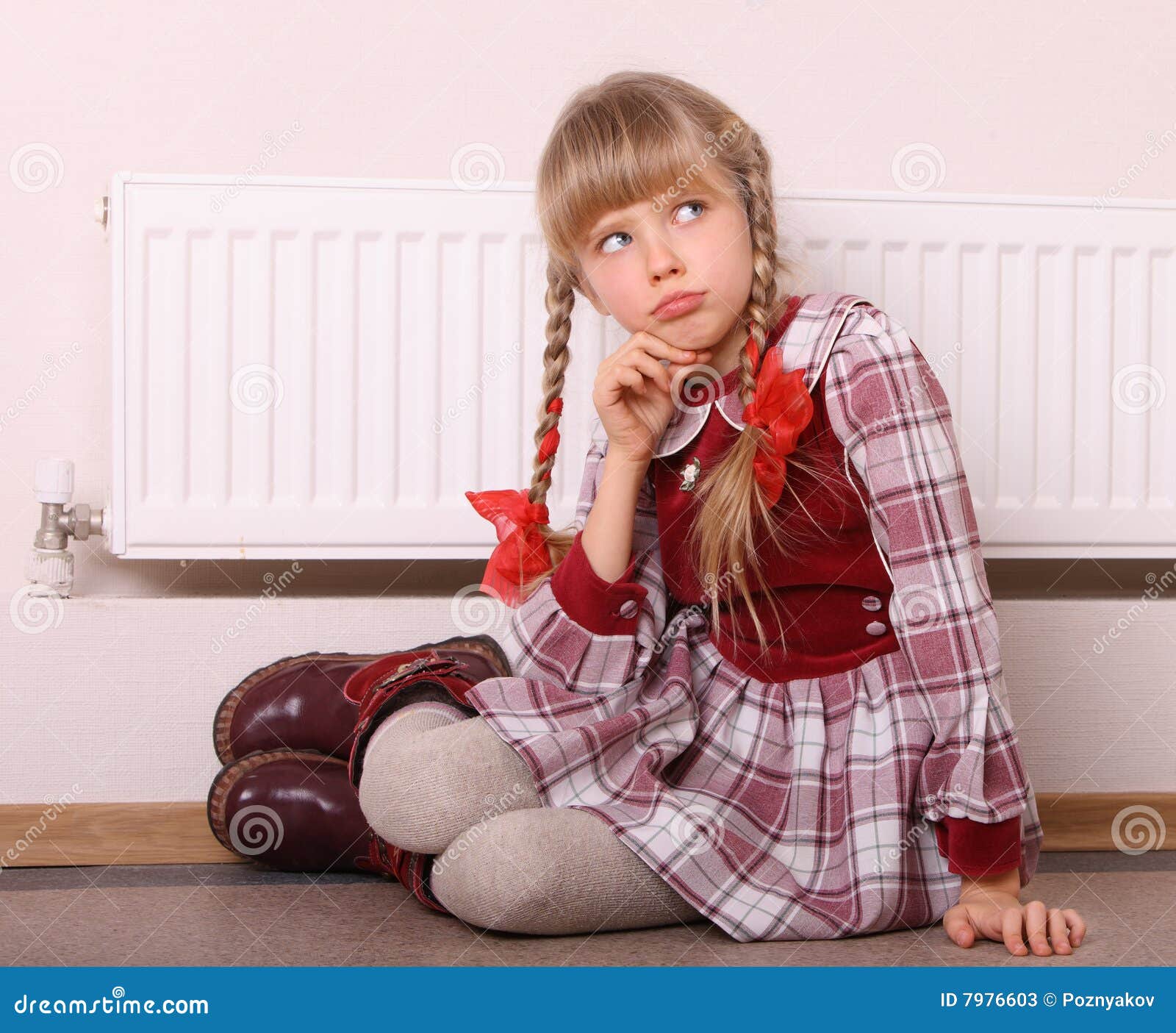 Girl Sitting Near Radiator. Warmth Depression. Stock Image - Image of ...
