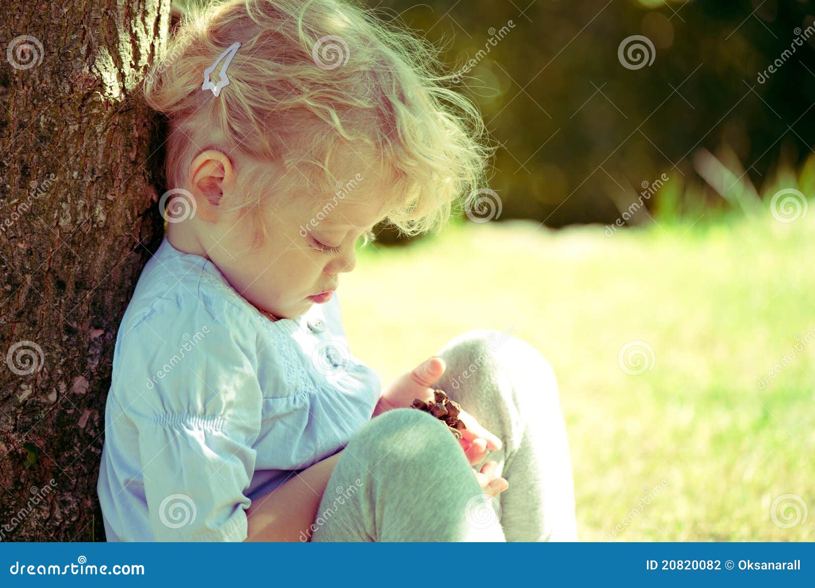 Girl Sitting Next To the Tree Stock Photo - Image of sunny, outing ...