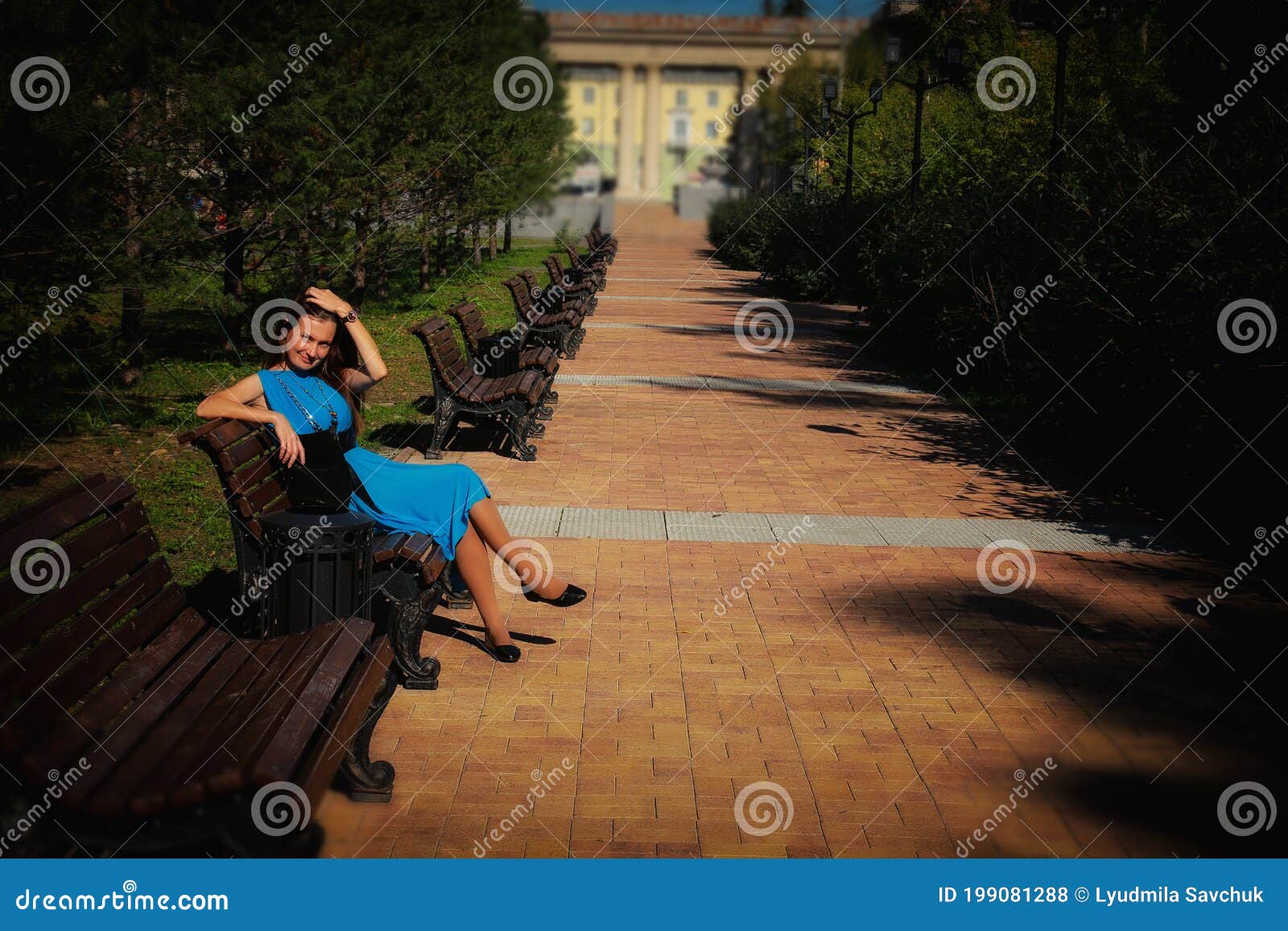 Girl Sitting on a Park Bench Stock Photo - Image of person, bench ...