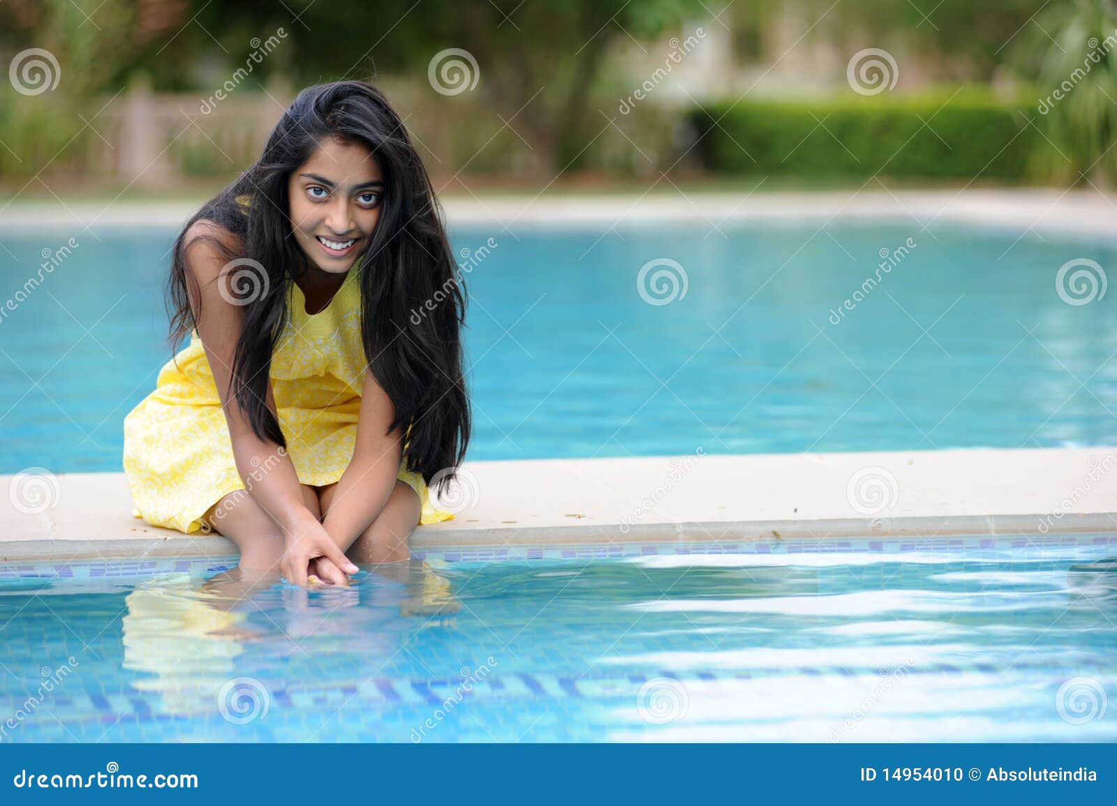 Girl sitting at pool stock photo. Image of water, traditionally - 14954010