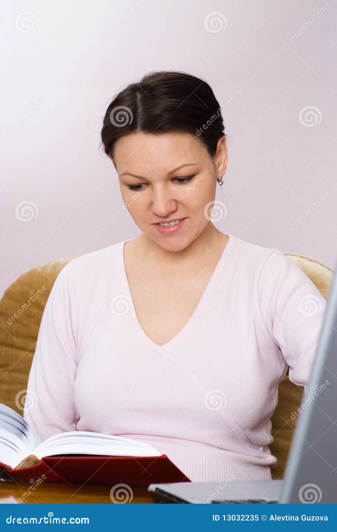 Girl is Sitting and Reading Stock Image - Image of computer, life: 13032235