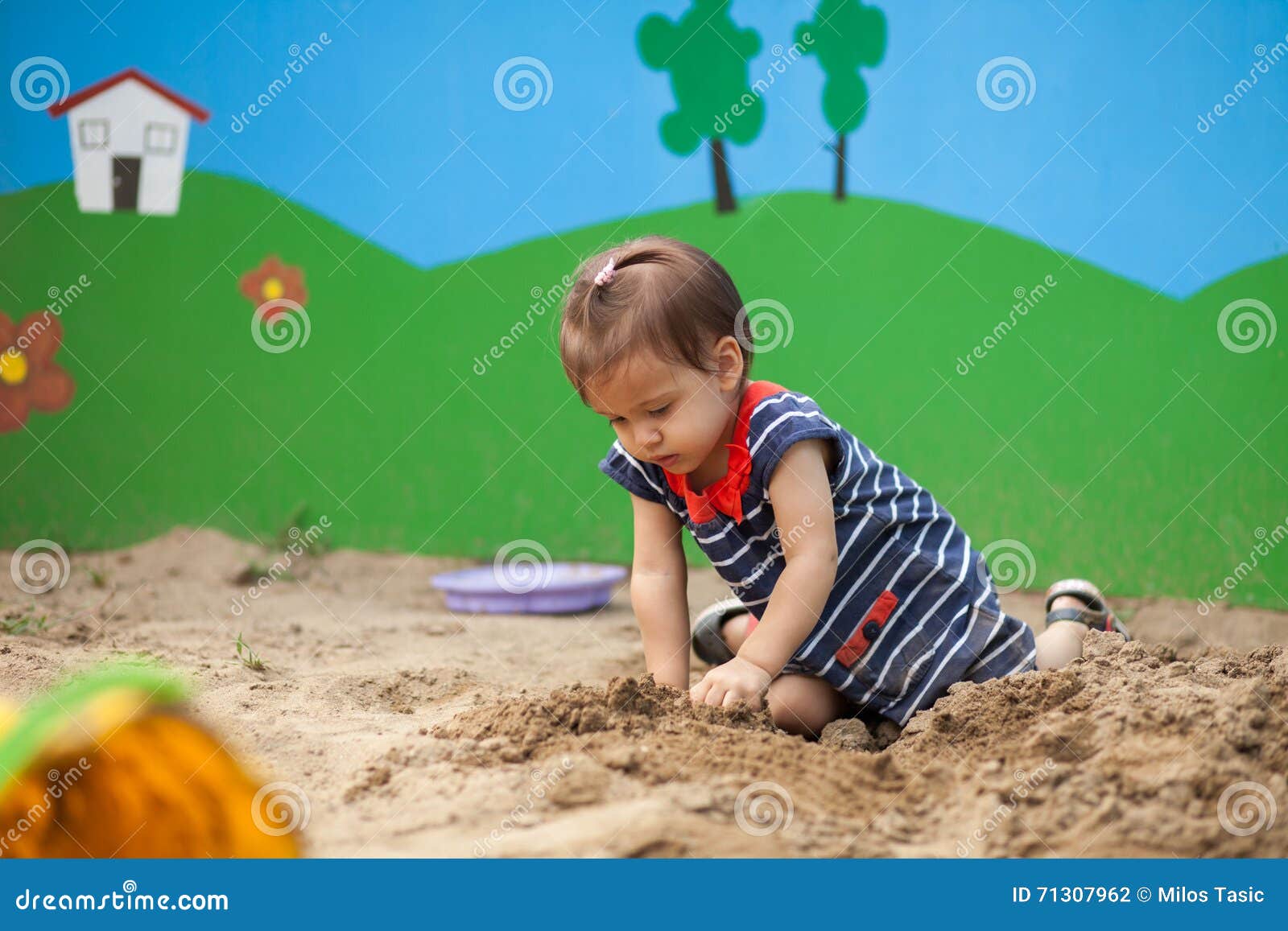 Girl Sitting in the Sand Playing Stock Photo - Image of dutch, portrait ...