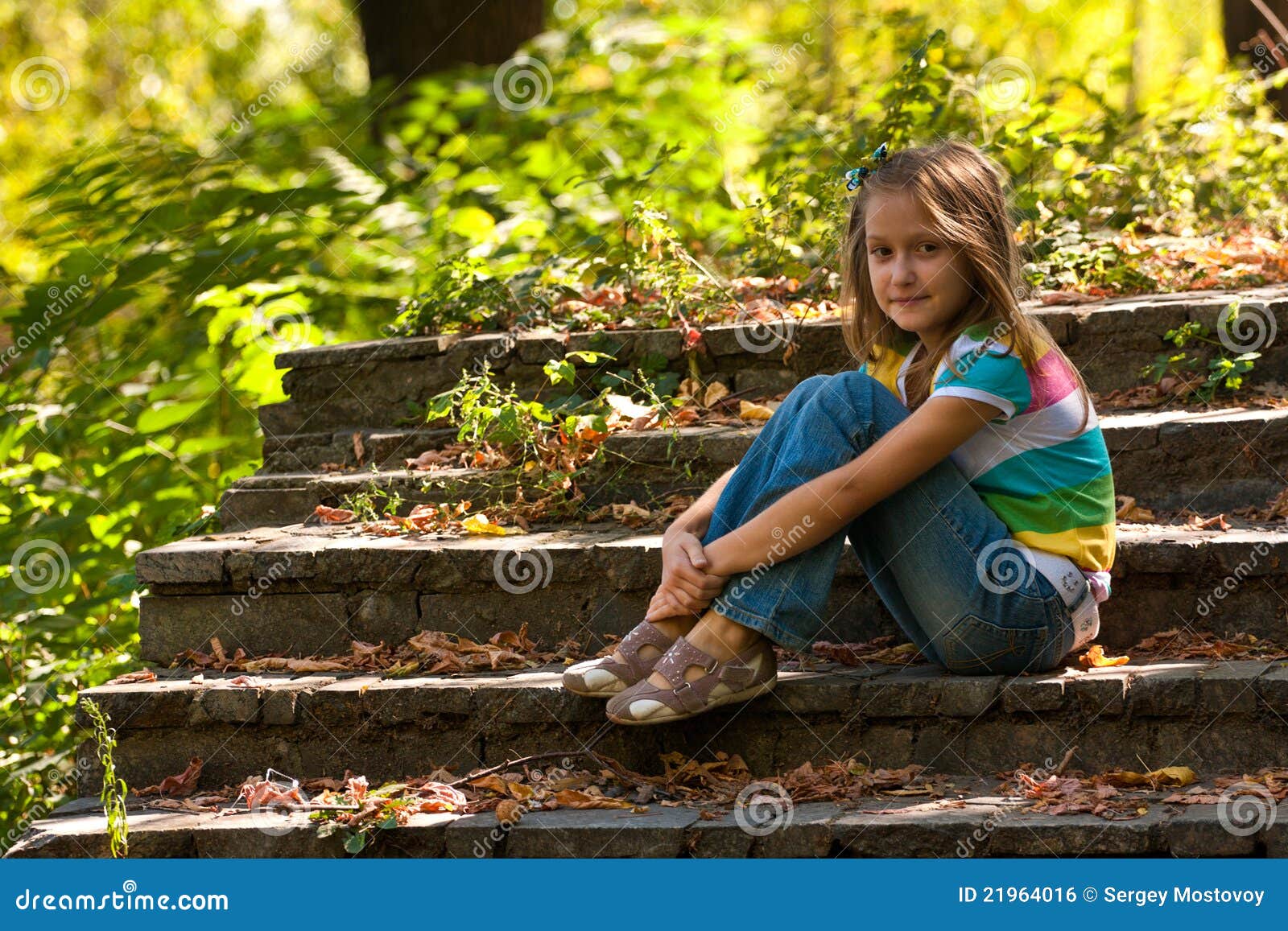 Girl sitting on a stairs stock photo. Image of people - 21964016