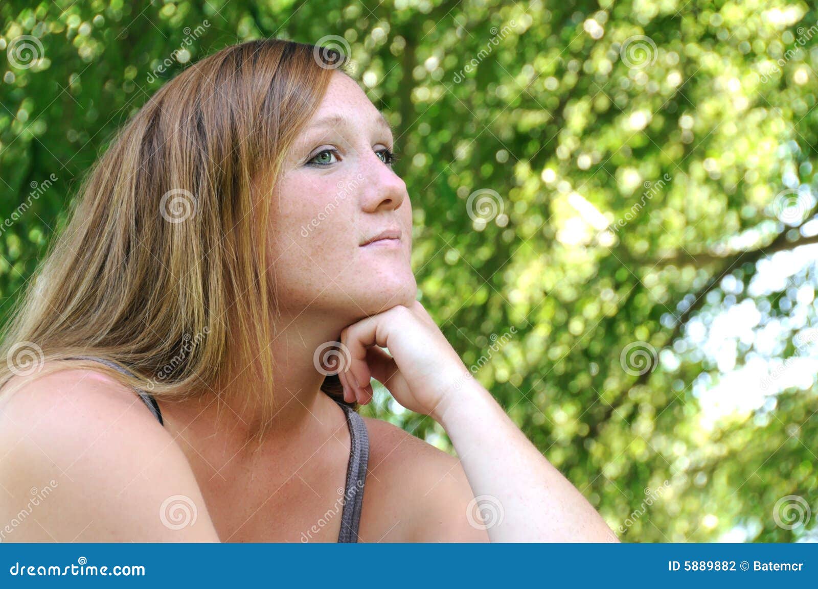 Girl sitting and thinking stock photo. Image of casual - 5889882