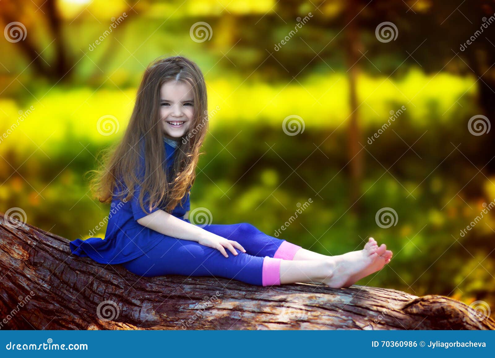 Girl sitting on a tree stock photo. Image of smile, sitting - 70360986