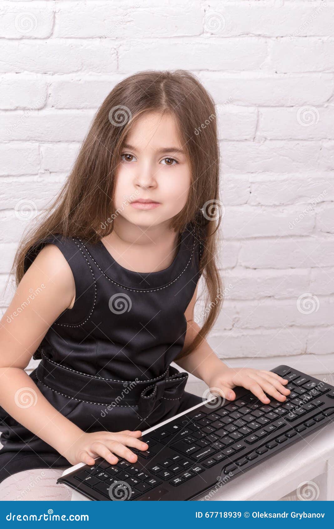 Girl Sitting and Working at the Keyboard Stock Image - Image of ...