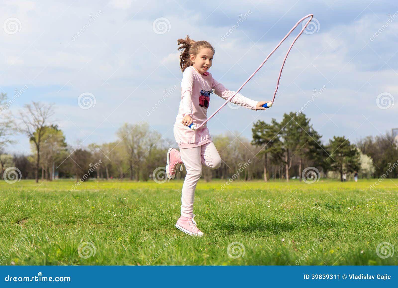 Girl with skipping rope stock image. Image of fitness - 39839311
