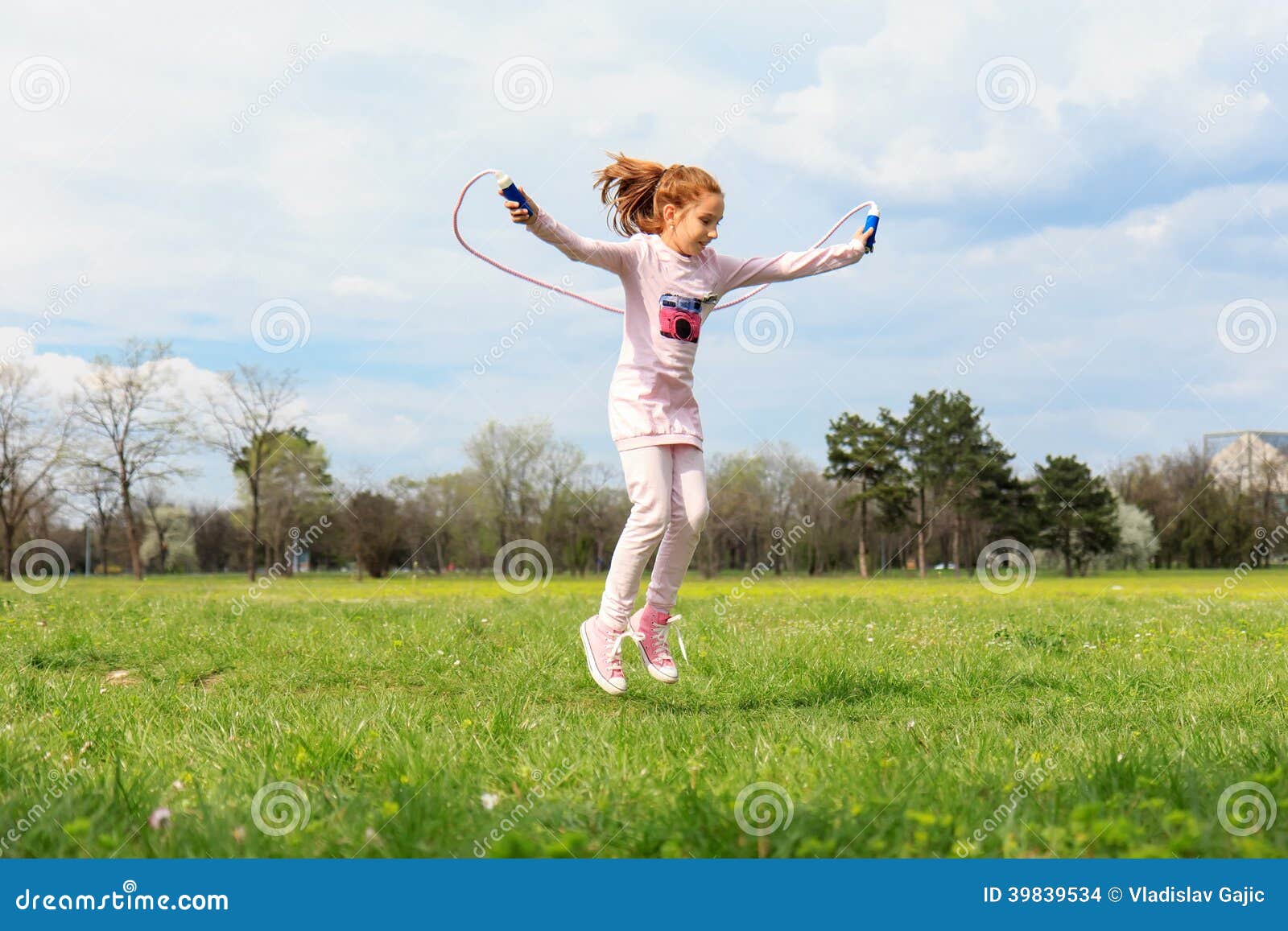 Girl with skipping rope stock photo. Image of outdoors - 39839534
