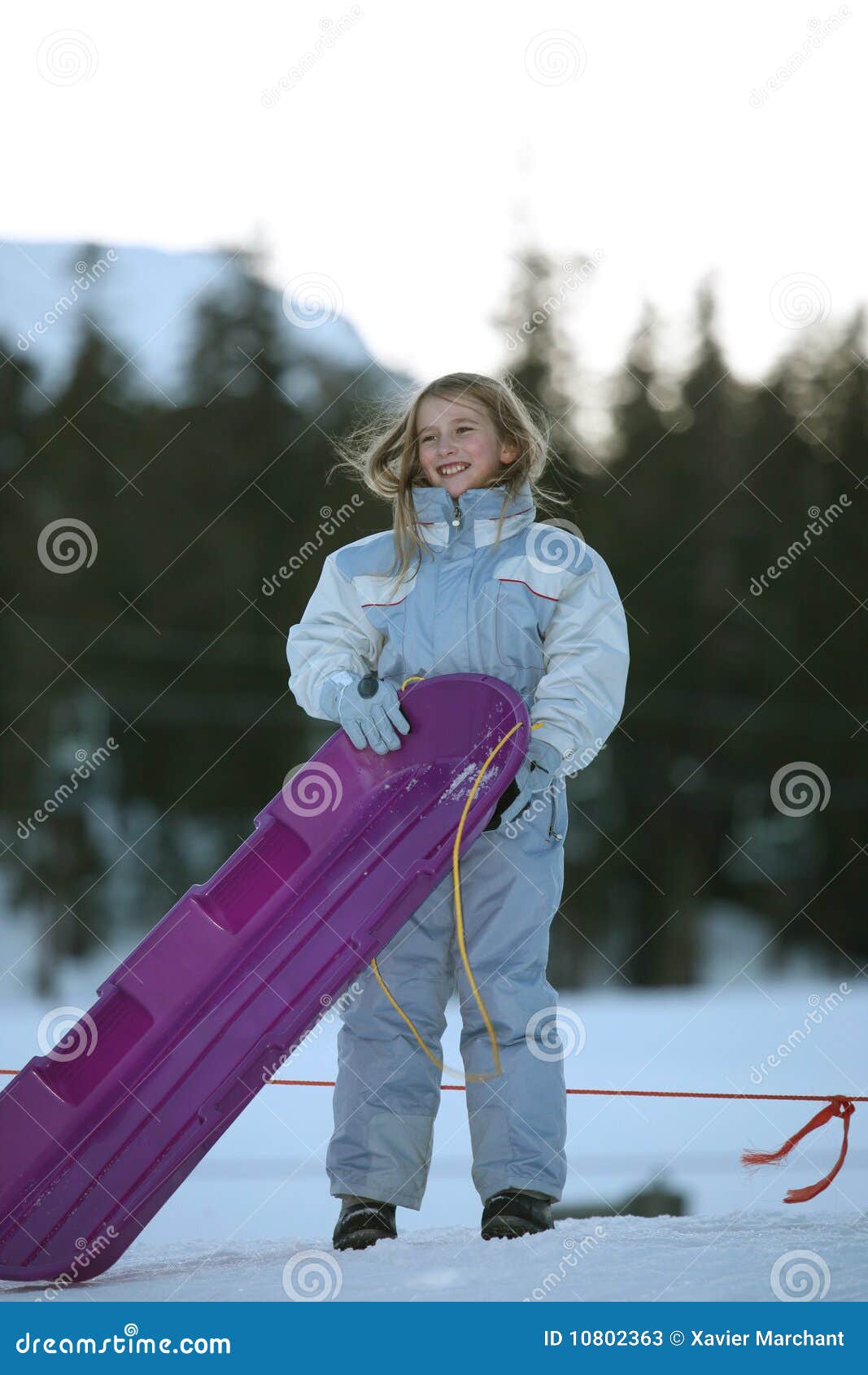Girl and sled stock image. Image of snow, mountain, teenager - 10802363