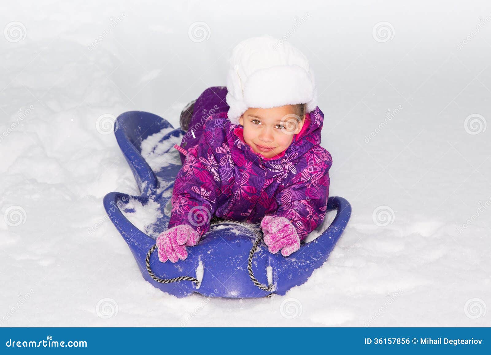 Girl on a Sled stock photo. Image of child, girl, cold - 36157856