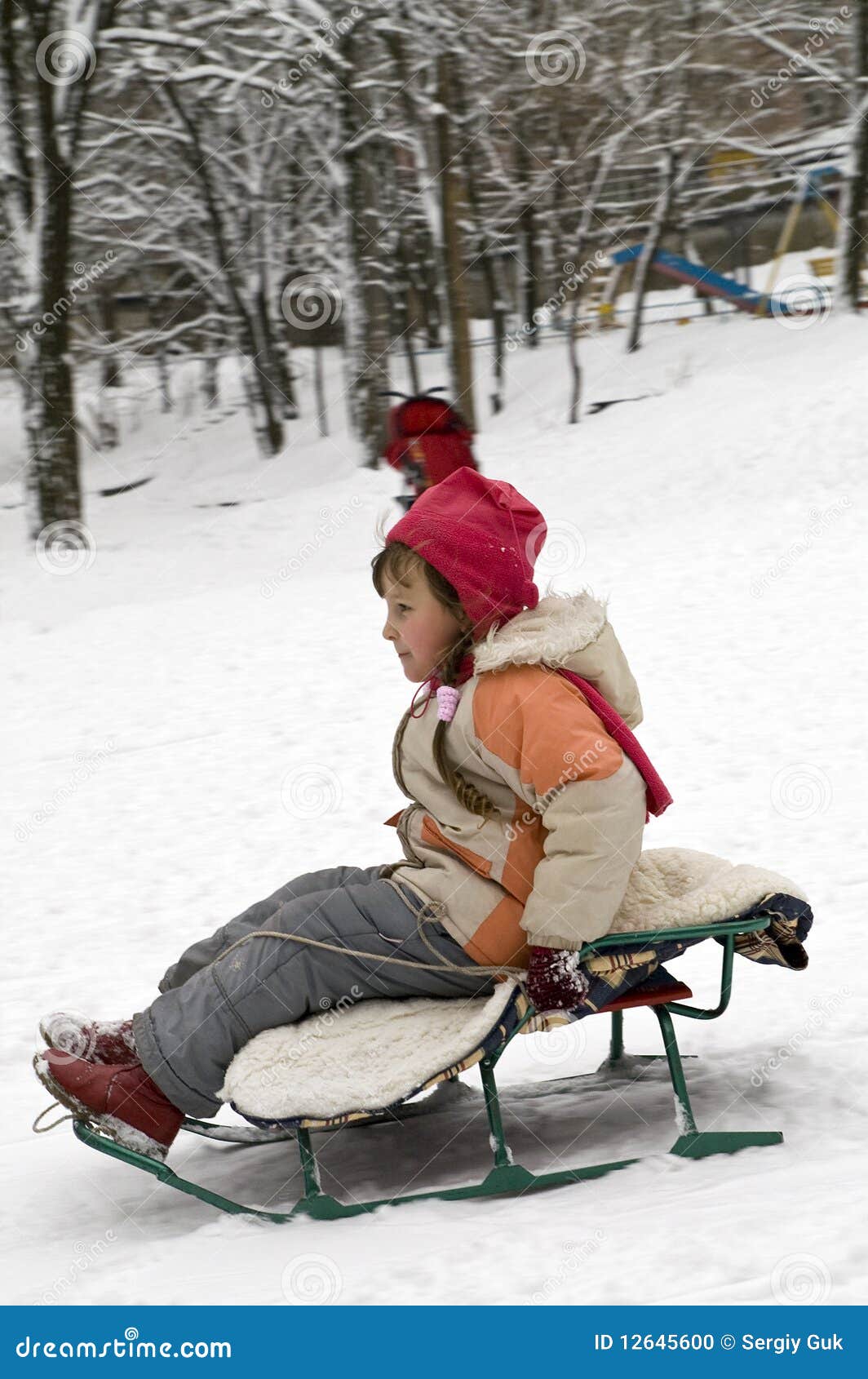Girl sledding. stock photo. Image of sledding, games - 12645600