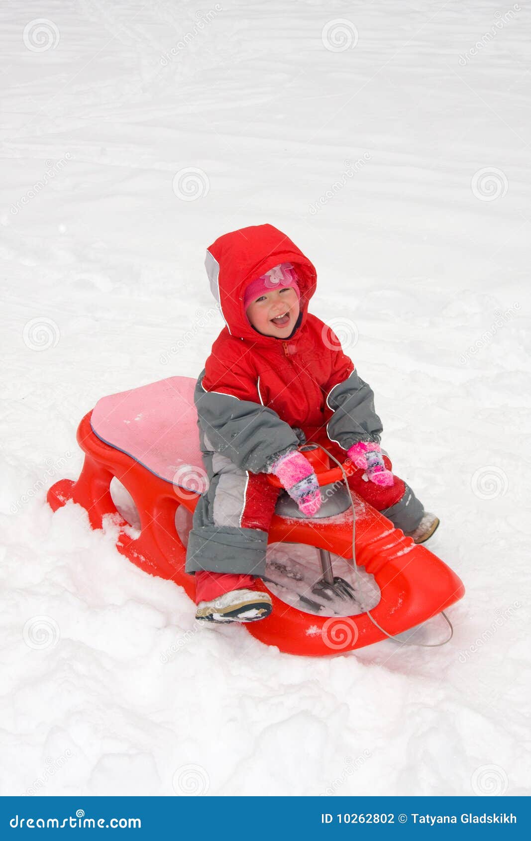 Girl sledding for a sledge stock photo. Image of little - 10262802