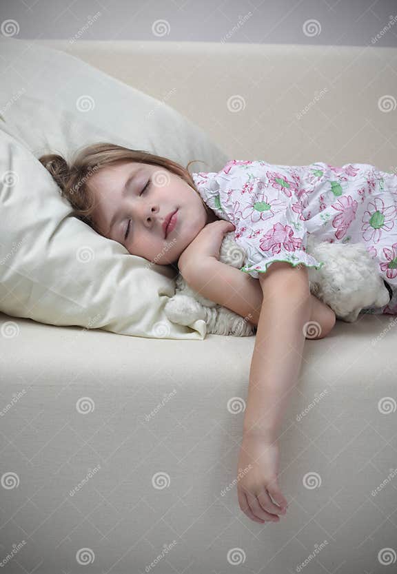 Girl sleep on sofa stock photo. Image of comfortable - 20609548