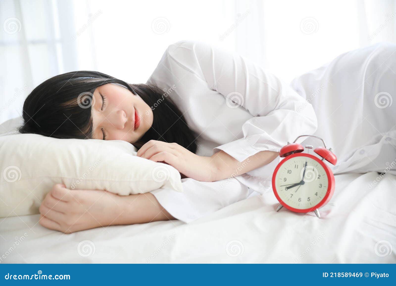 Girl Sleeping with Clock at White Bedroom Stock Image - Image of clock ...