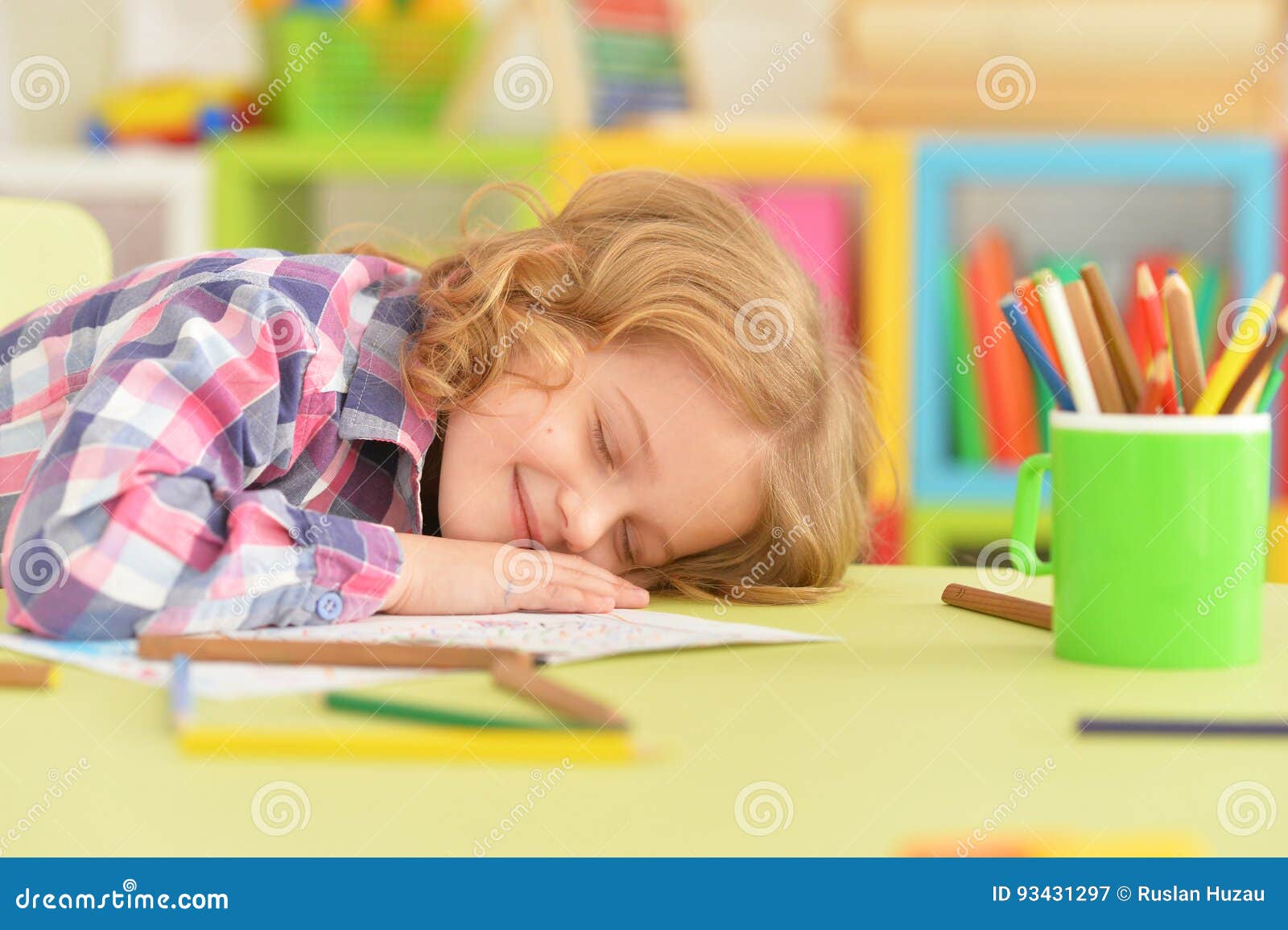Girl sleeping on table stock image. Image of innocent - 93431297