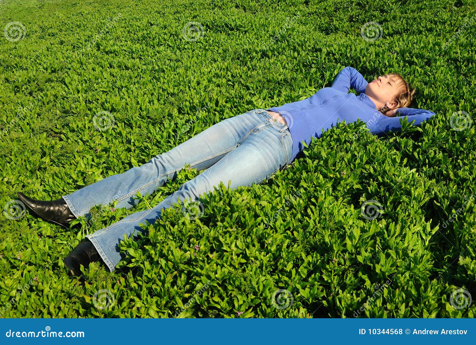 The girl sleeps in a grass stock photo. Image of pretty - 10344568