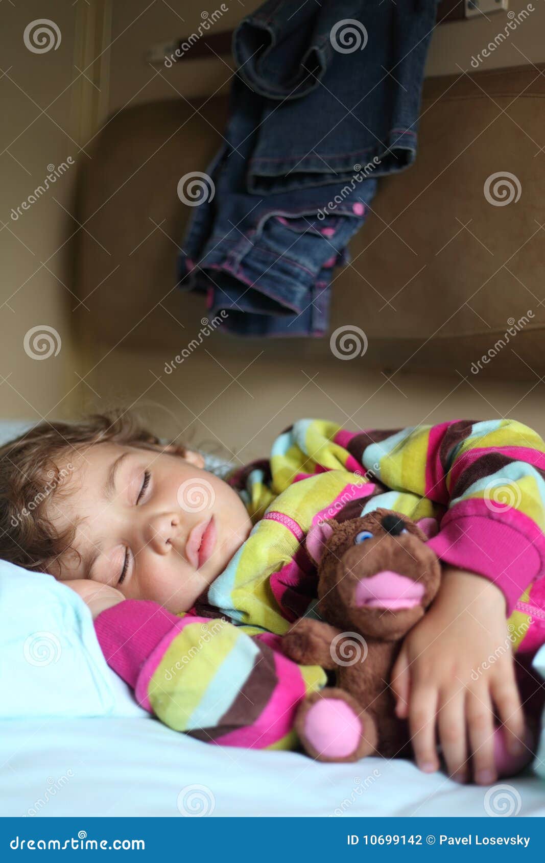 Girl Sleeps in Train with Puppet Stock Photo - Image of beauty, shelf ...