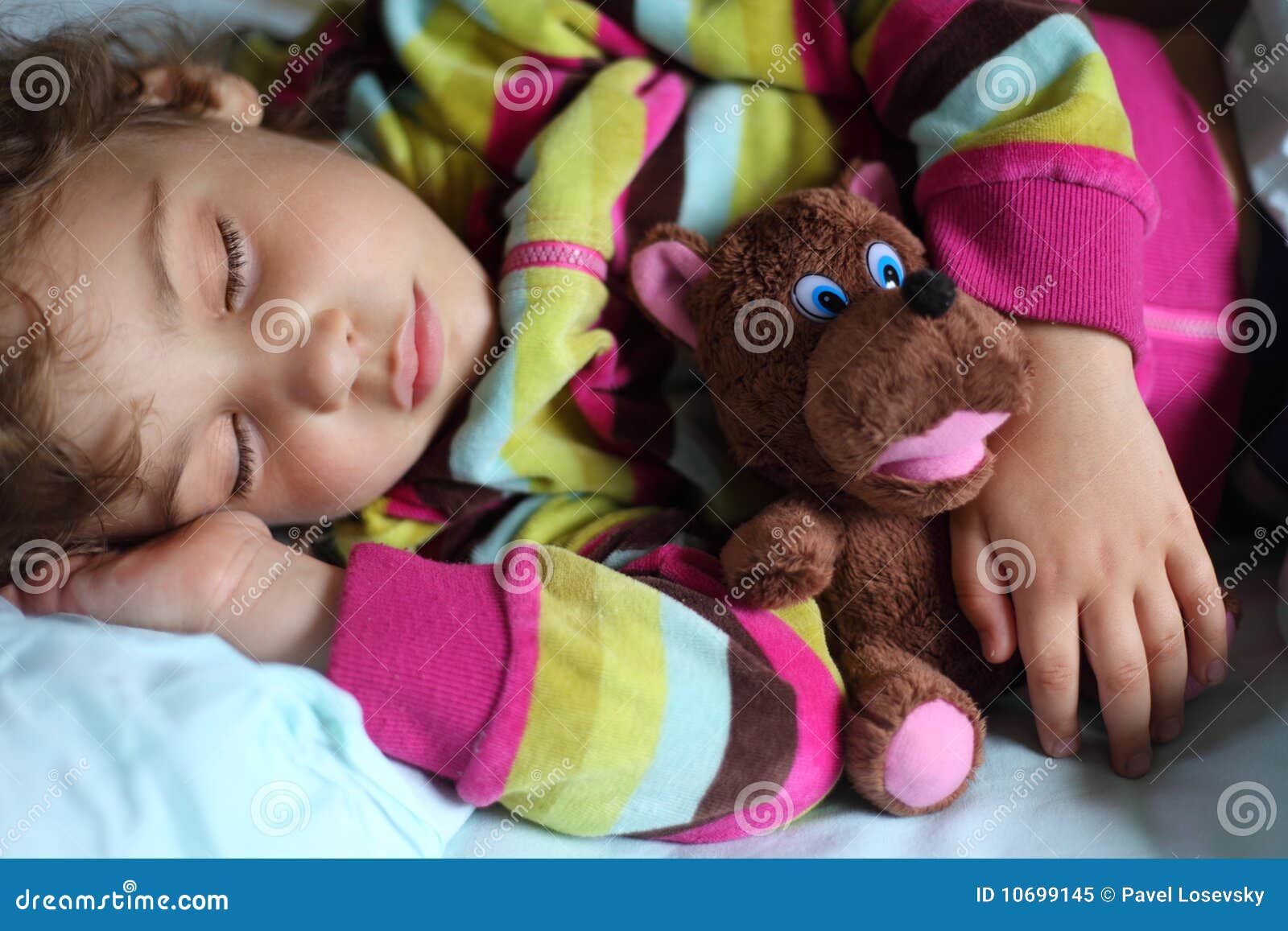 Girl Sleeps in Train with Puppet Stock Image - Image of nose, pillow ...