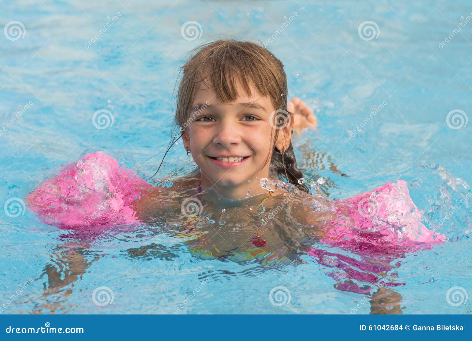 The Girl in the Sleeves Floats Stock Photo - Image of look, pool: 61042684