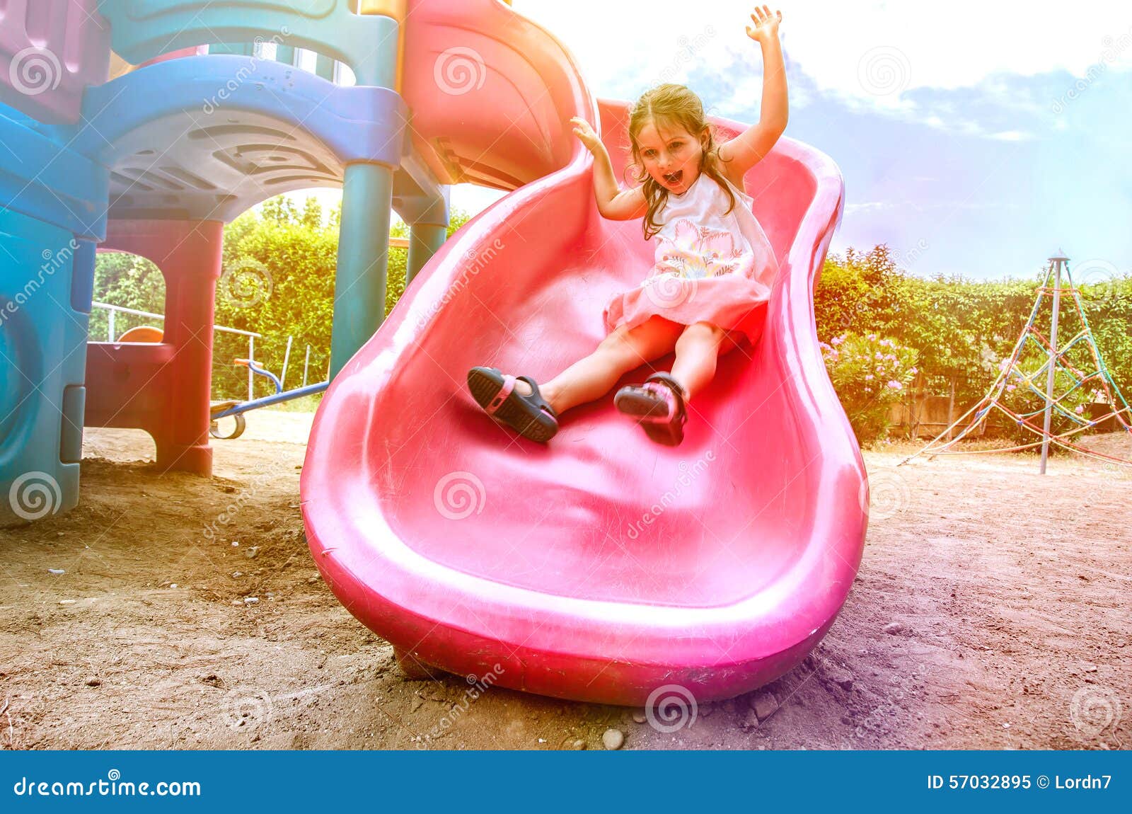 Girl on Slide stock image. Image of amusement, outdoors - 57032895