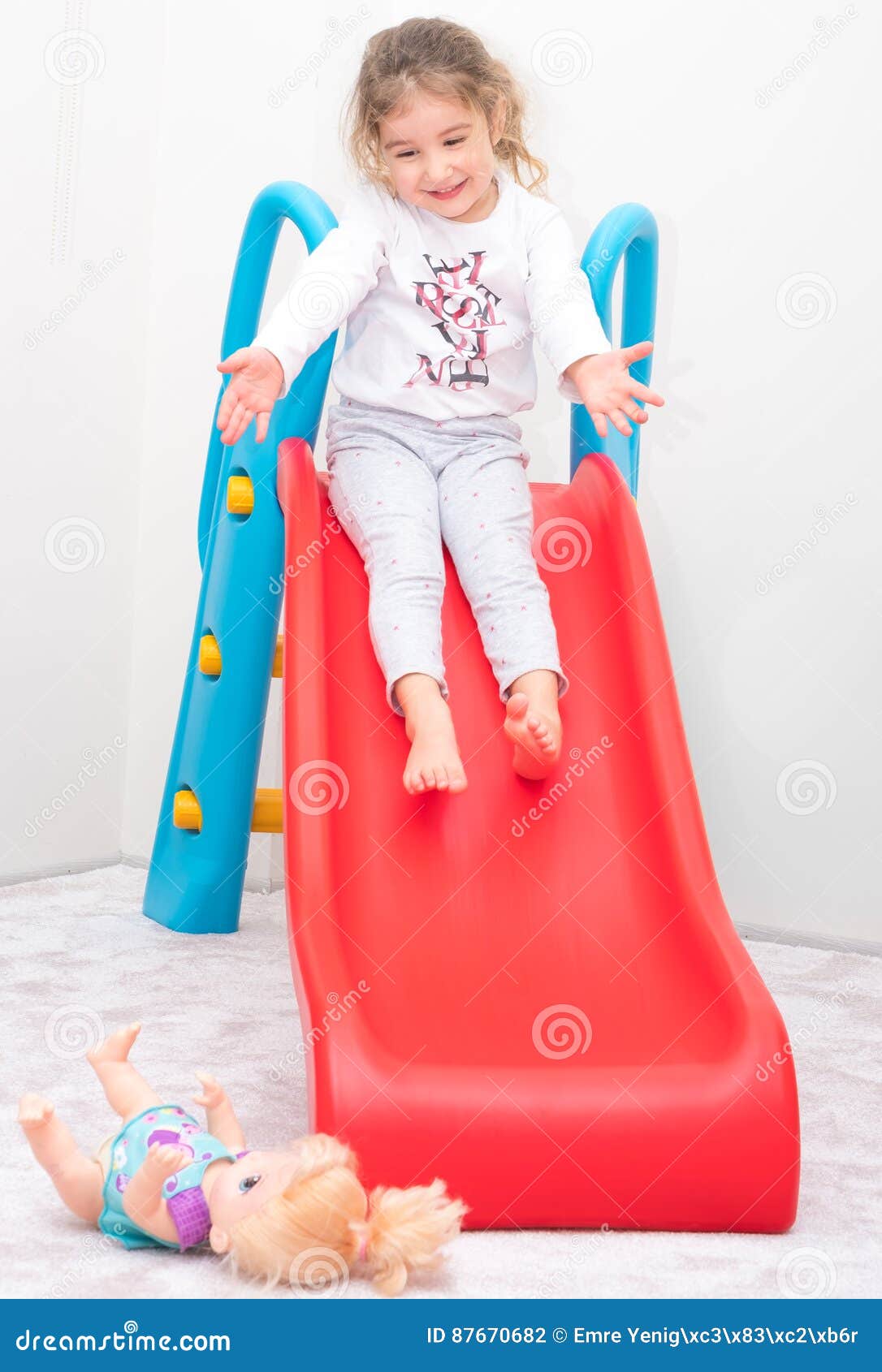 Girl sliding stock photo. Image of white, happy, little - 87670682