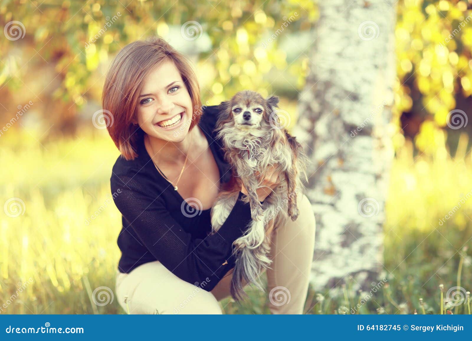 Girl with a small dog stock image. Image of dogs, beautiful - 64182745