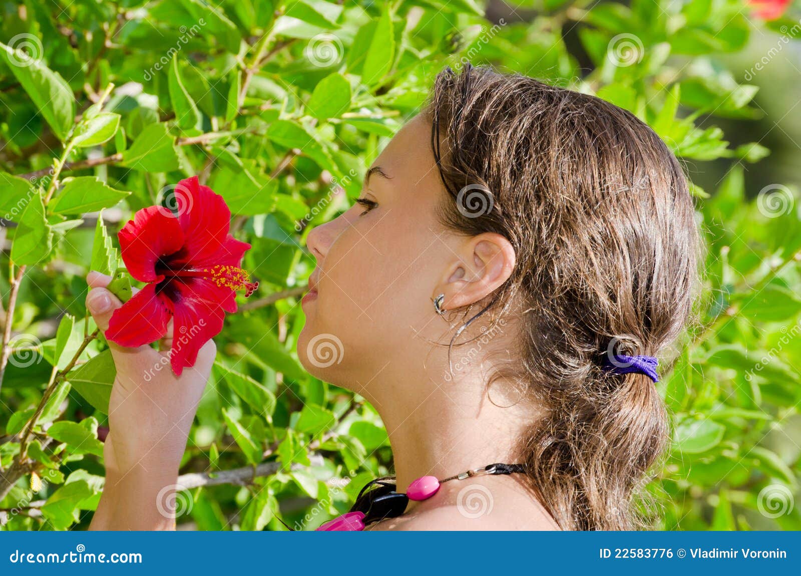 Girl Smells an Exotic Flower Stock Photo - Image of attractive ...