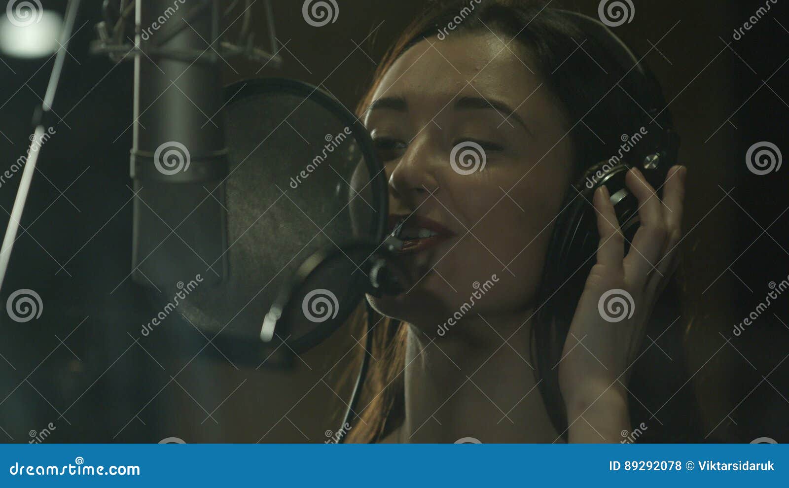 Girl with a Smile Singing in Studio. Stock Footage - Video of acial ...