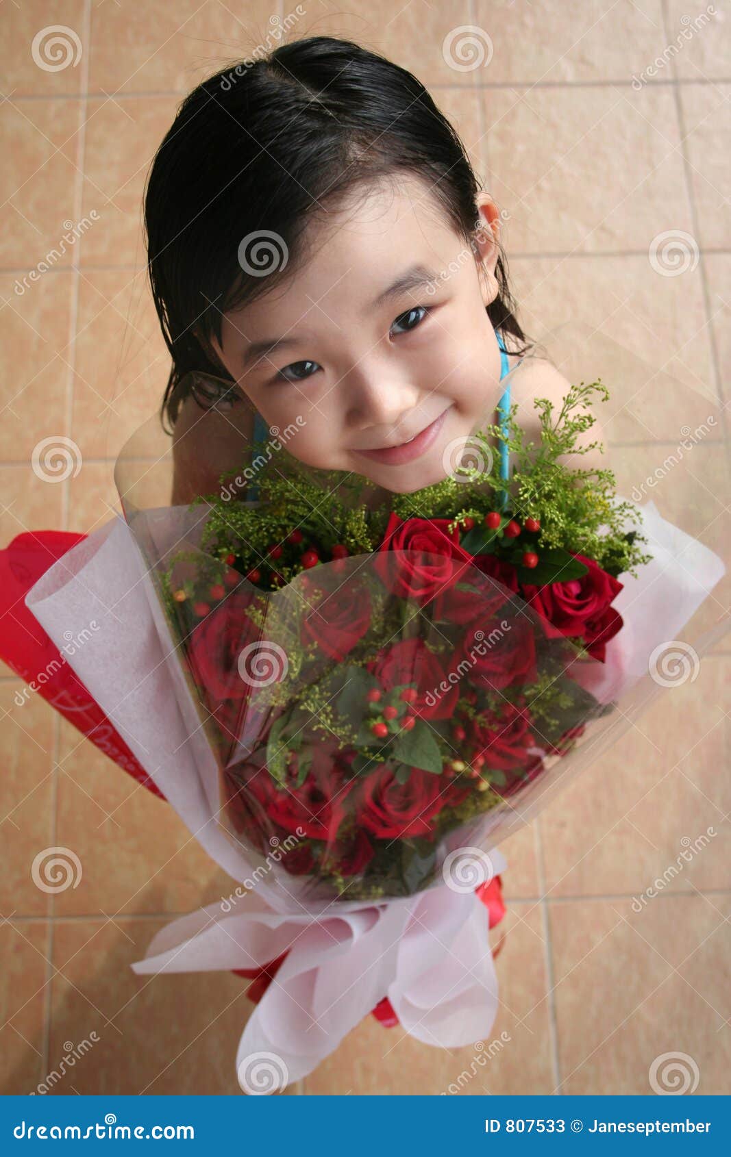 Girl Smiling & Holding Bouquet of Roses Stock Image - Image of child ...