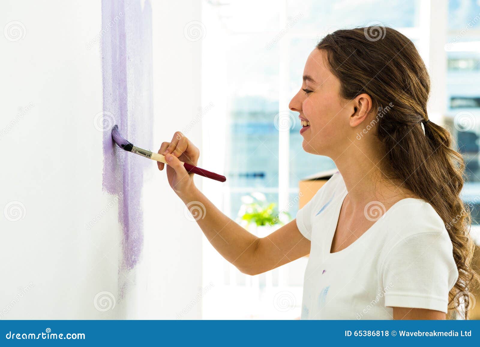 Girl smiling and painting stock photo. Image of domestic - 65386818