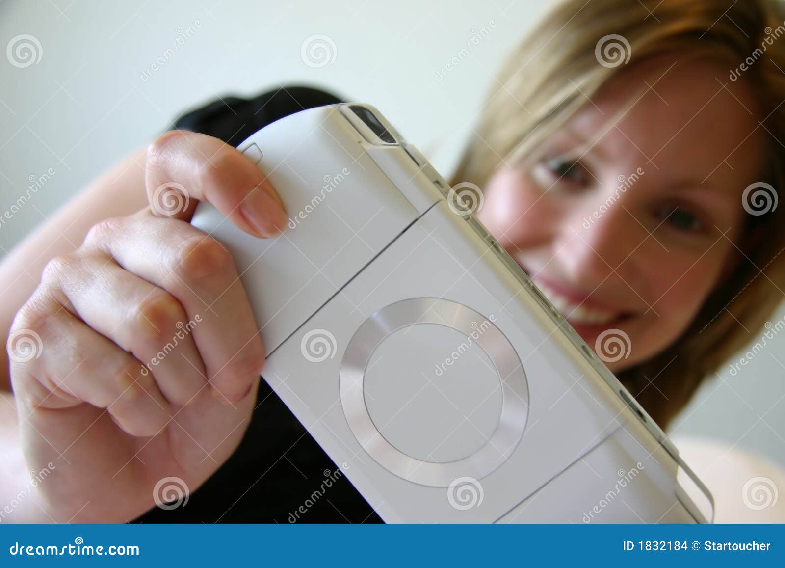 Girl Smiling and Playing Handheld Game Console Editorial Stock Image ...