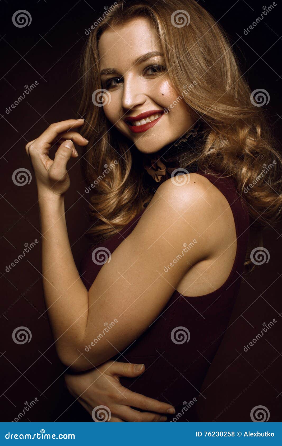 Girl Smiling on a Red Background Stock Photo - Image of studio, people ...