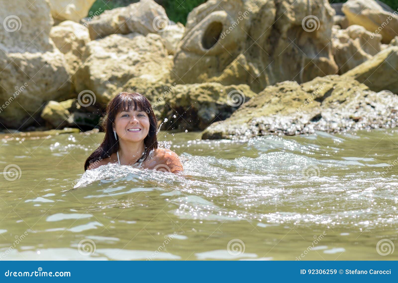 Girl smiling in the sea stock image. Image of attractive - 92306259