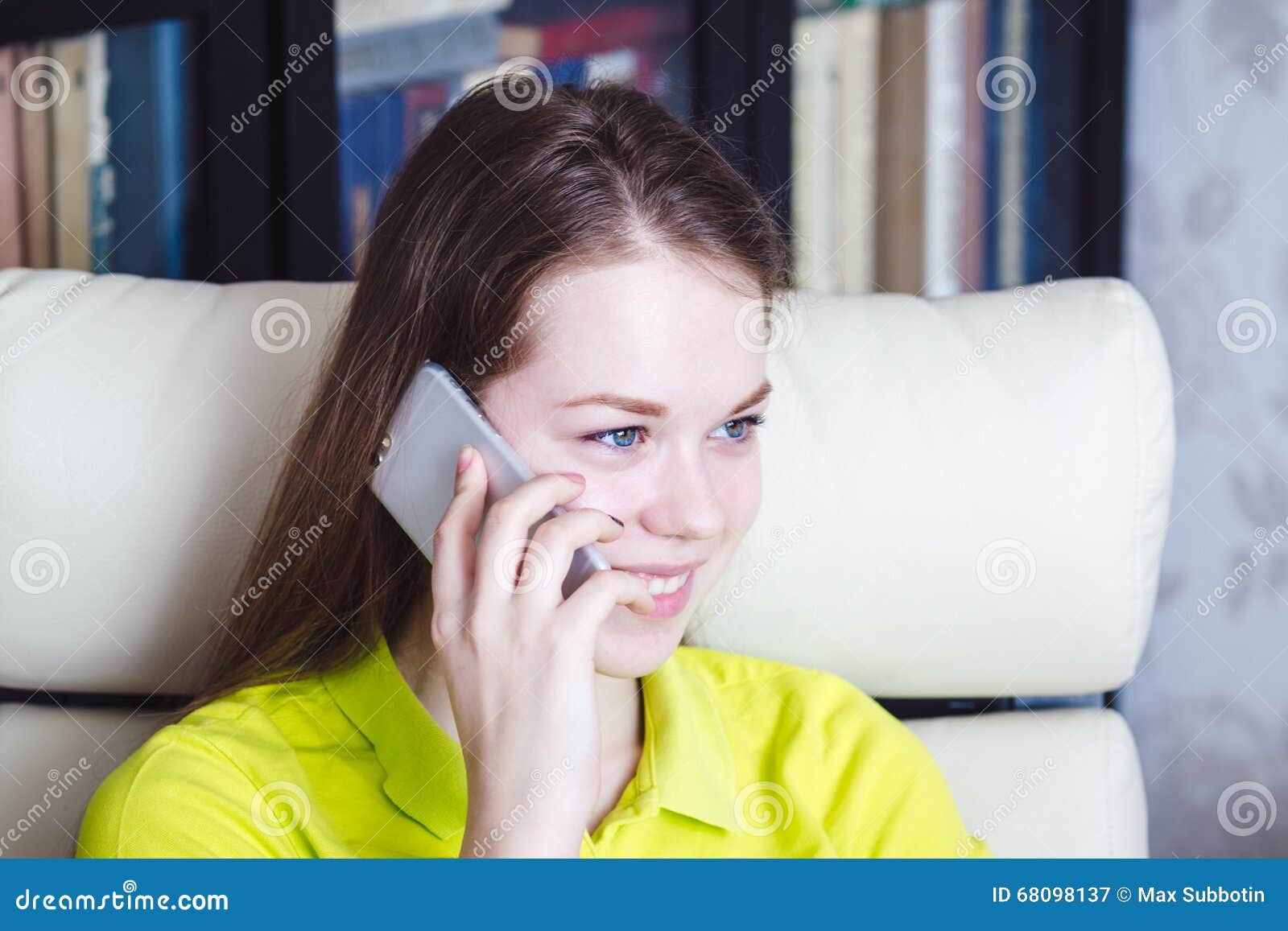 A Girl is Smiling, Talking and Holding Mobile Phone Stock Image - Image ...