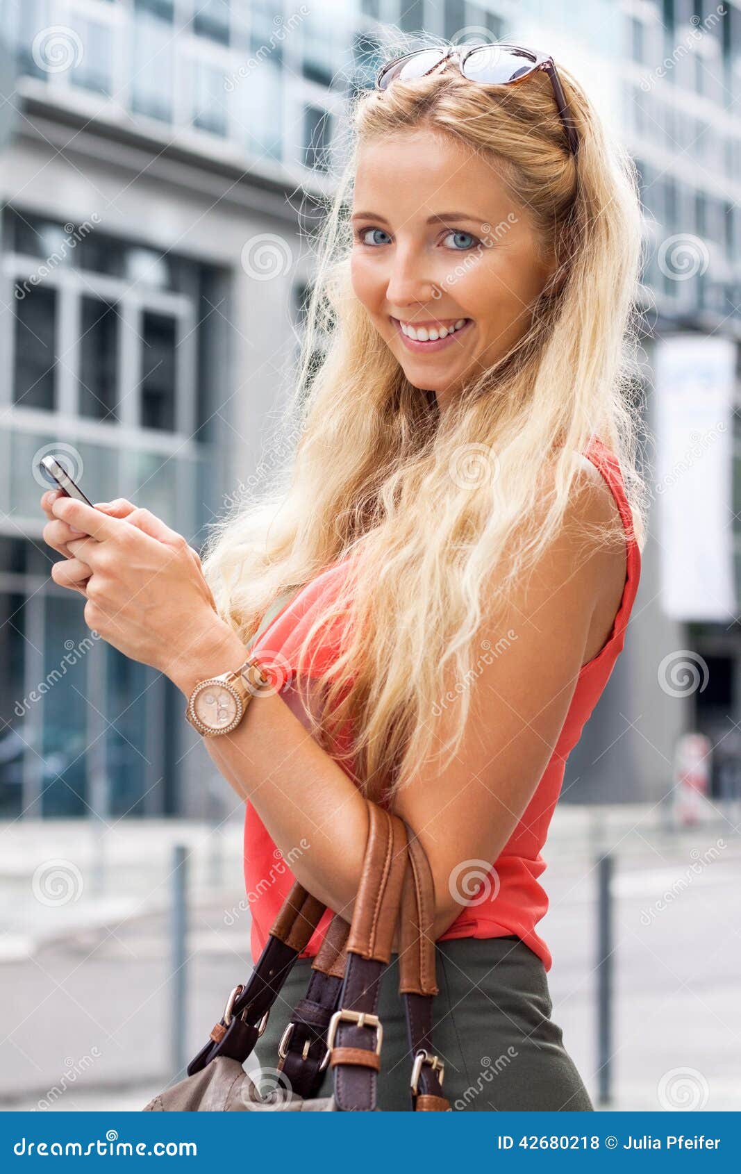 Girl smiling while texting stock photo. Image of sunglasses - 42680218