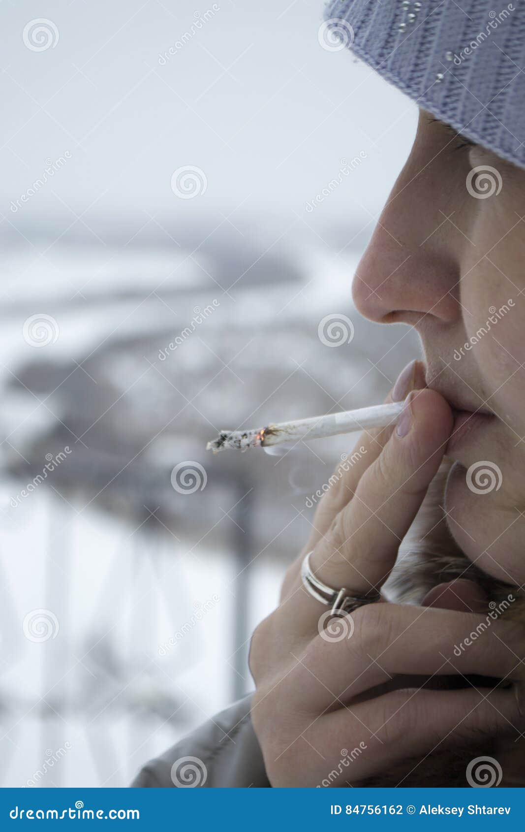 The Girl Smokes a Cigarette Editorial Photography - Image of cigarette ...