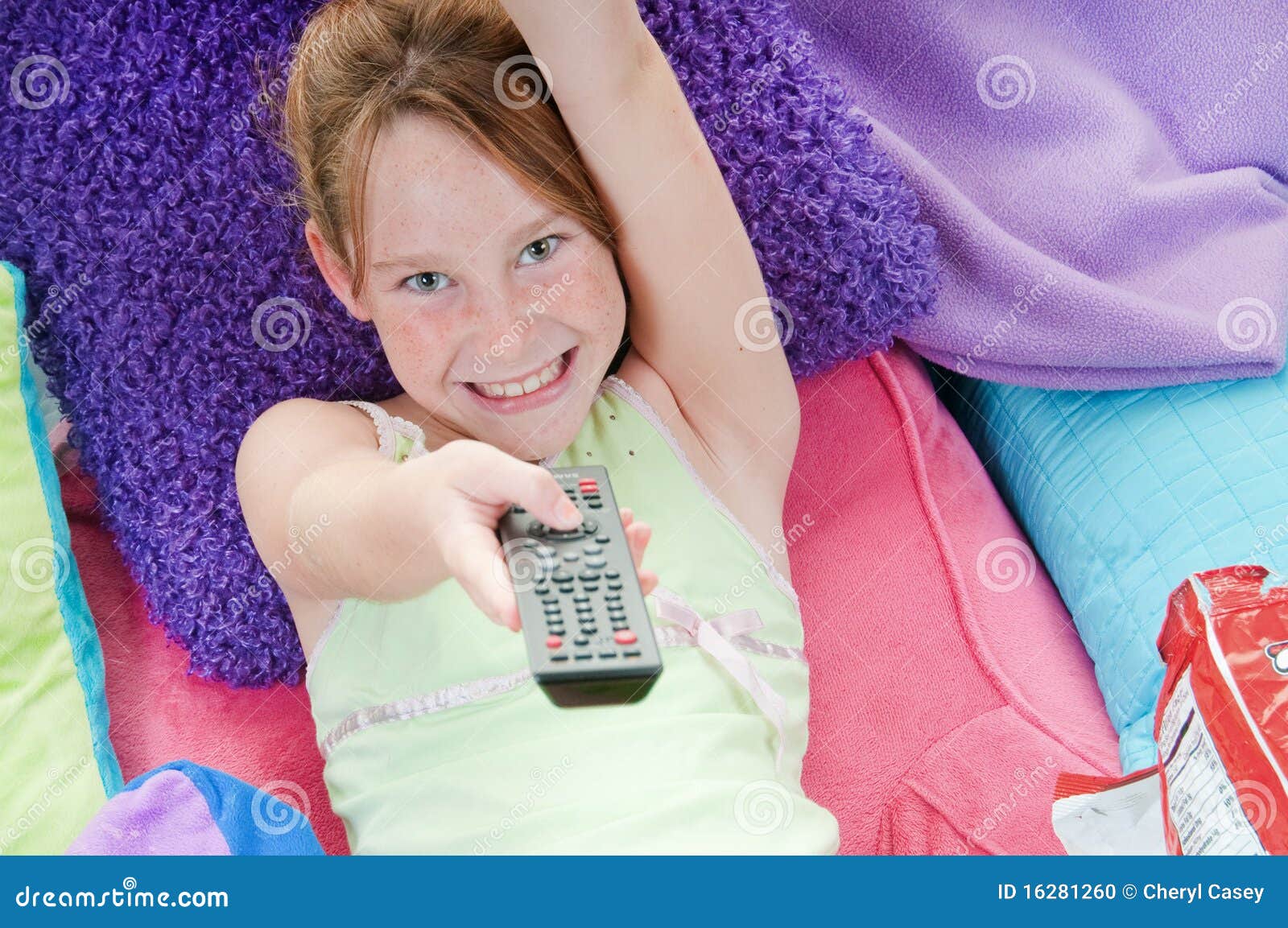 Girl Snacking in Bed Watching TV Stock Photo - Image of lime, decorate ...