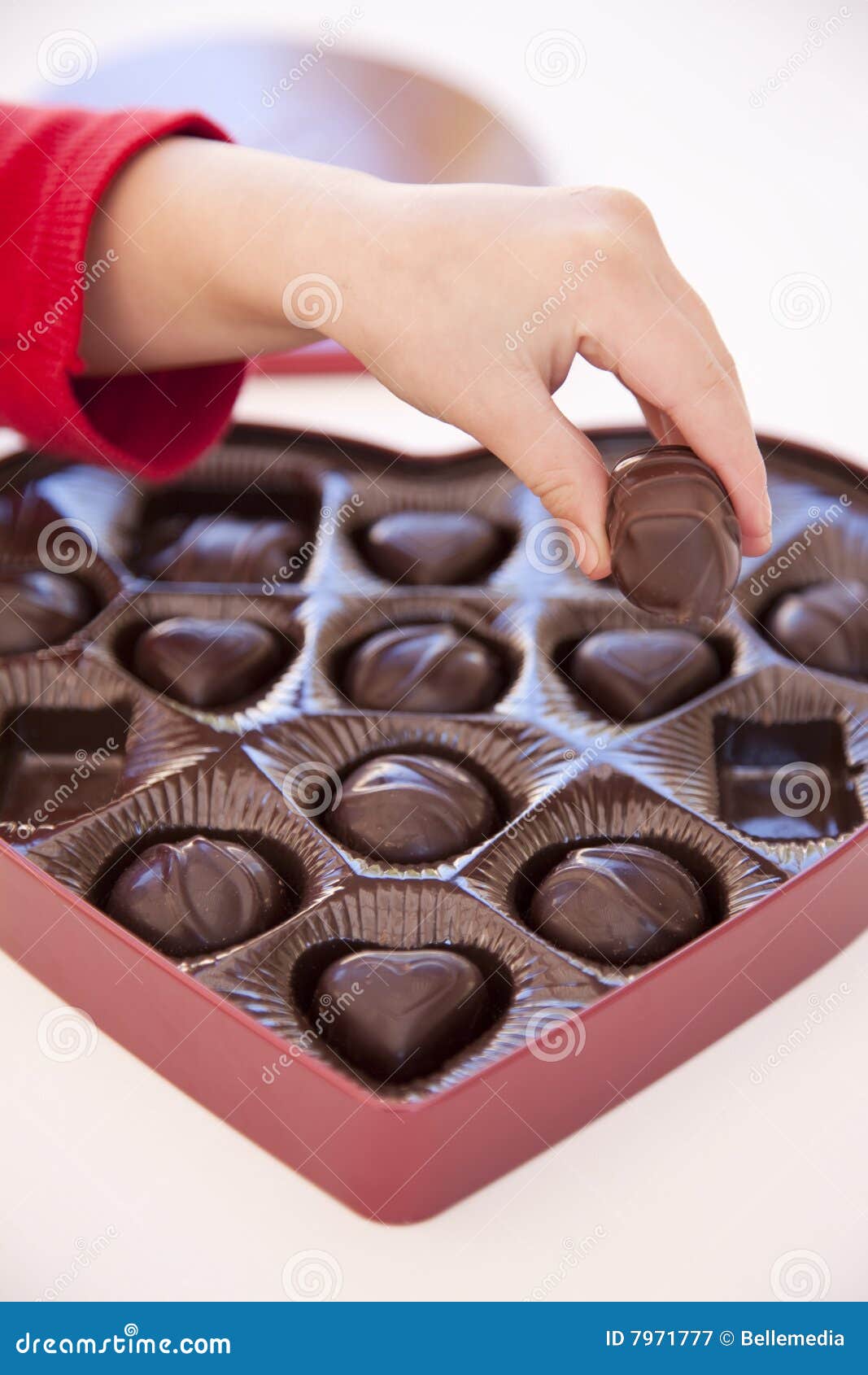 Girl sneaking a chocolate stock image. Image of naughty - 7971777