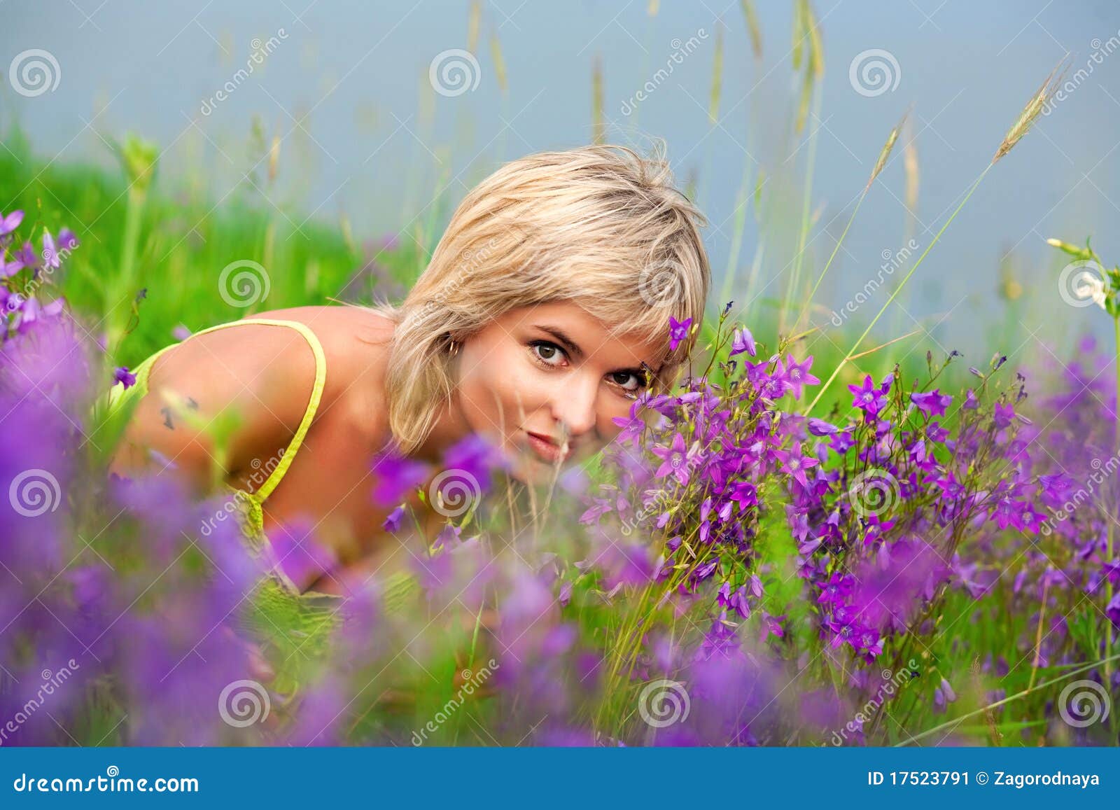 Girl Sniffing Flowers in the Meadow Stock Image - Image of idyllic ...