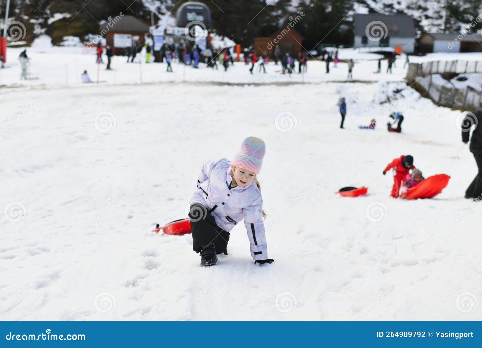 A Girl with Snow Bob Sledding in the Snow Stock Photo - Image of mother ...