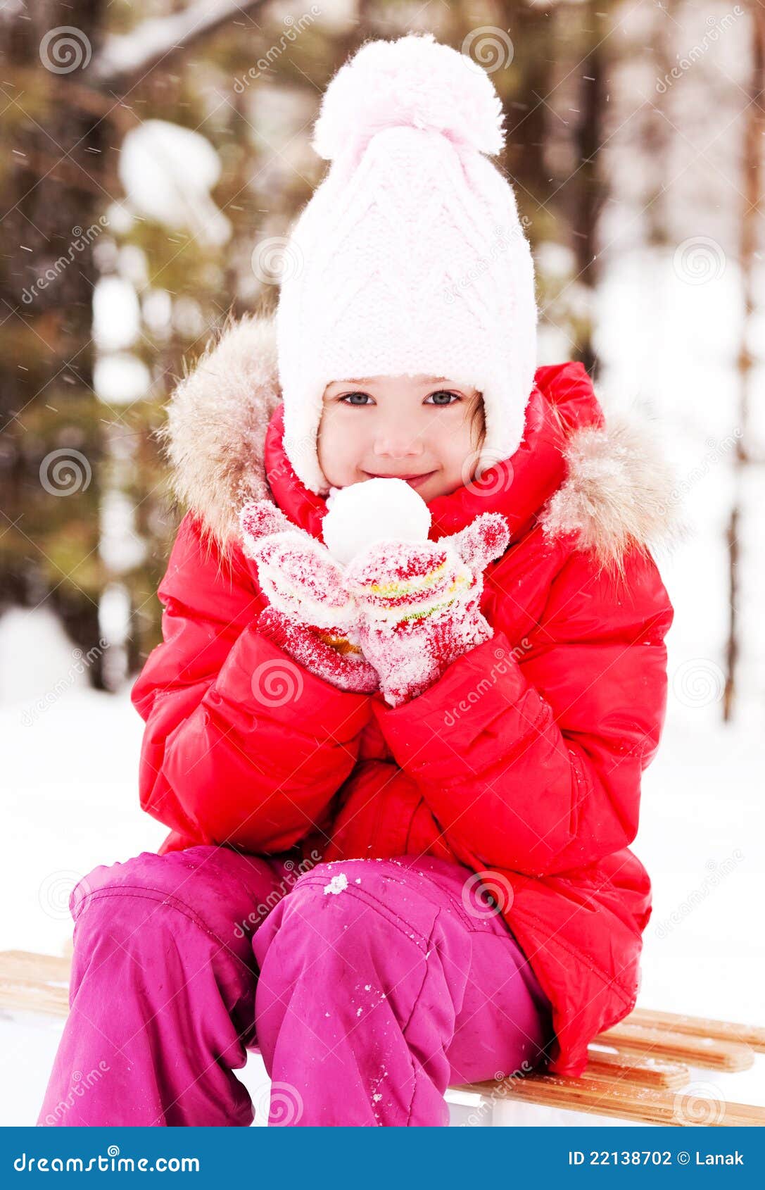Girl with a snowball stock photo. Image of mountain, child - 22138702