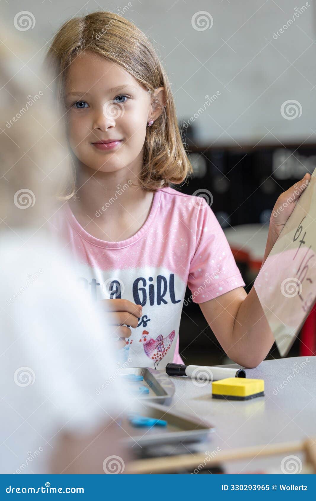 A Girl is Solving a Math Problem on a White Board Stock Image - Image ...