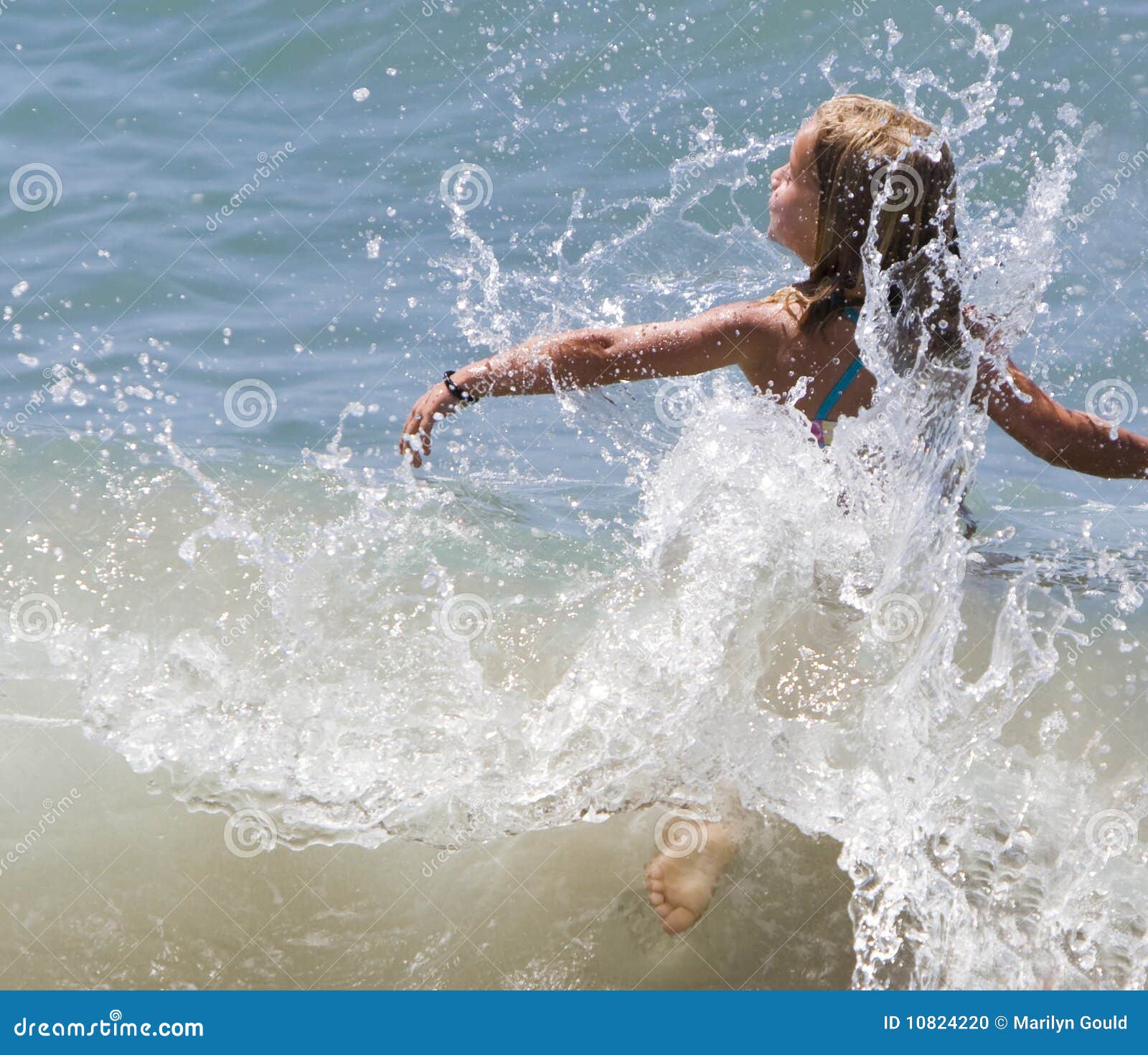 Girl Splashing through Wave Stock Photo - Image of refreshing, girl ...